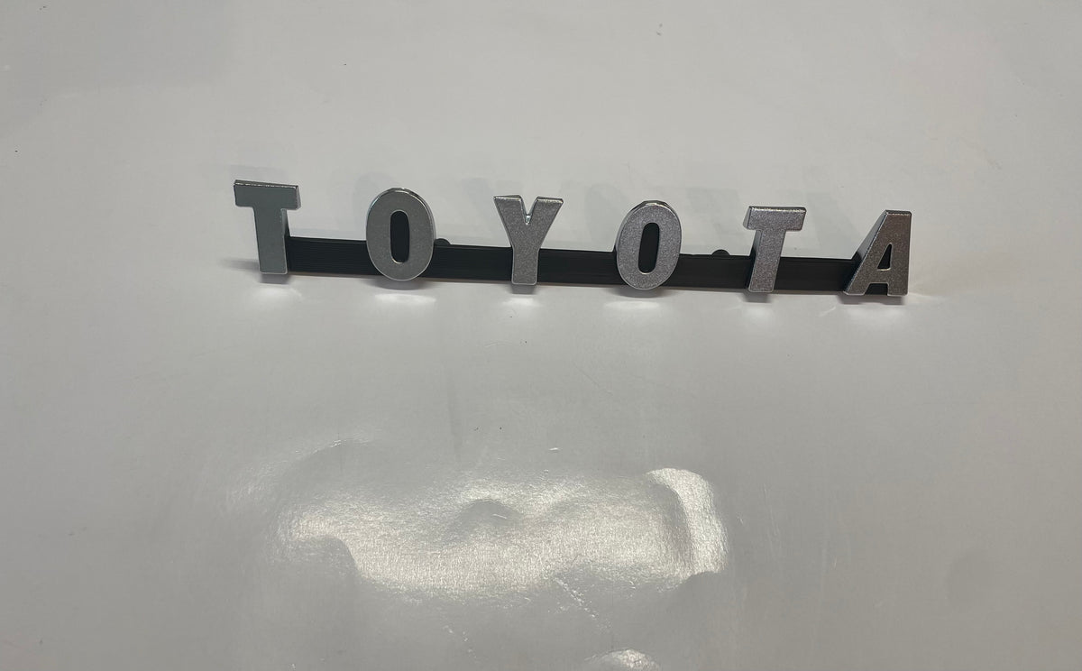Genuine Toyota Badge Front Panel – Complete Maintenance Services